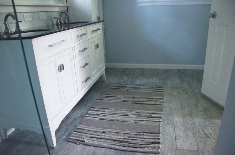 Master Bathroom Renovation with Sliding Mirror Over the Window ...