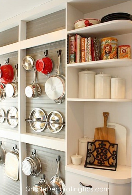 DIY Wall Mounted Pot Rack from a Shallow Display Cabinet | Remodelaholic