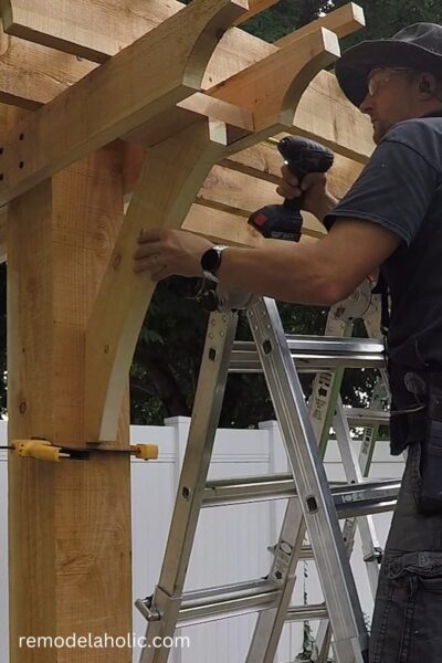DIY Arbor Swing: How to Install Curved Wood Knee Braces | Remodelaholic