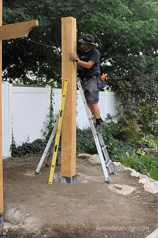 DIY Arbor Swing: How to Install Wood Beam Supports | Remodelaholic